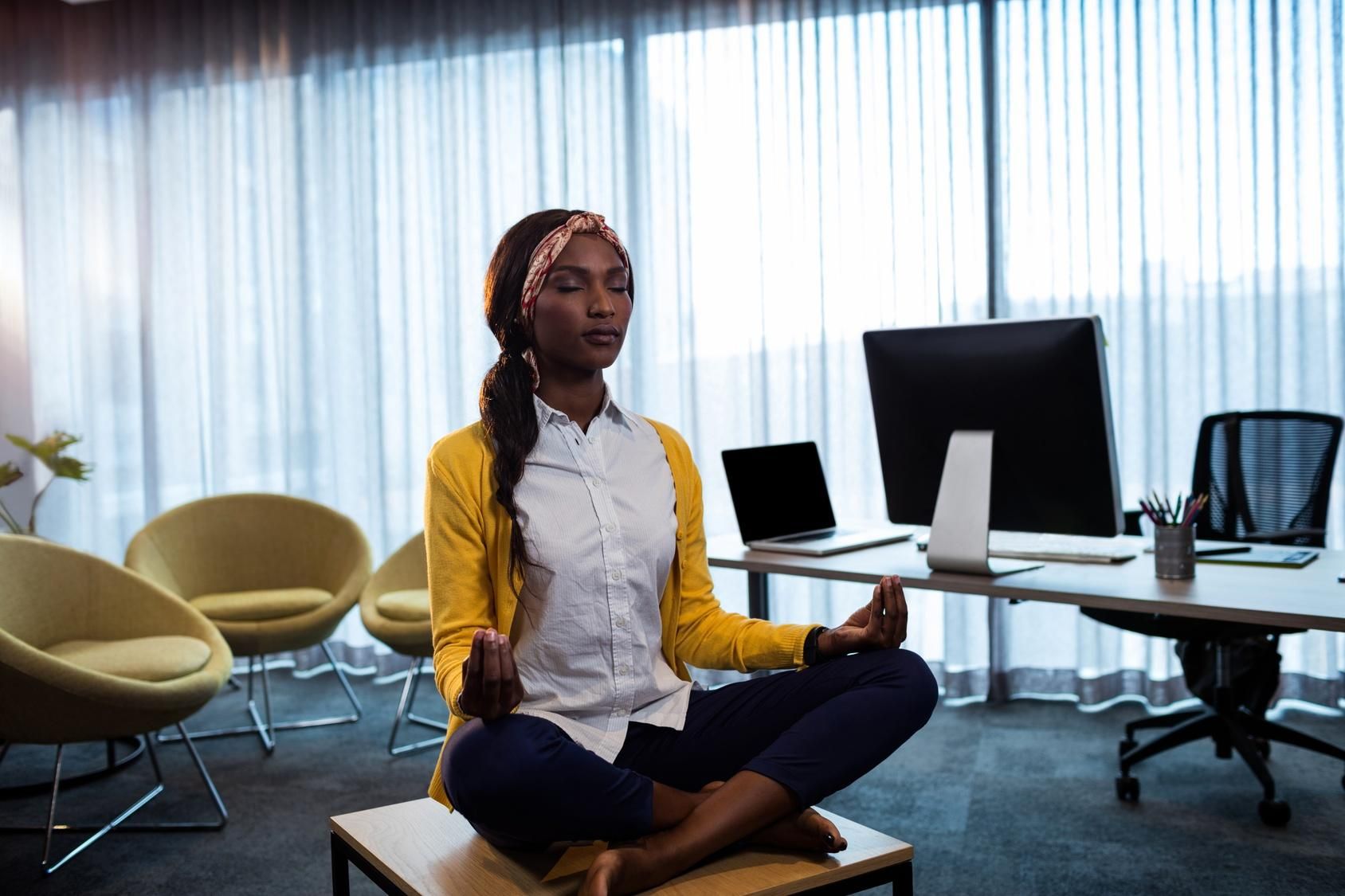 10 Office Yoga Poses to Try at Your Desk - AllBusiness.com